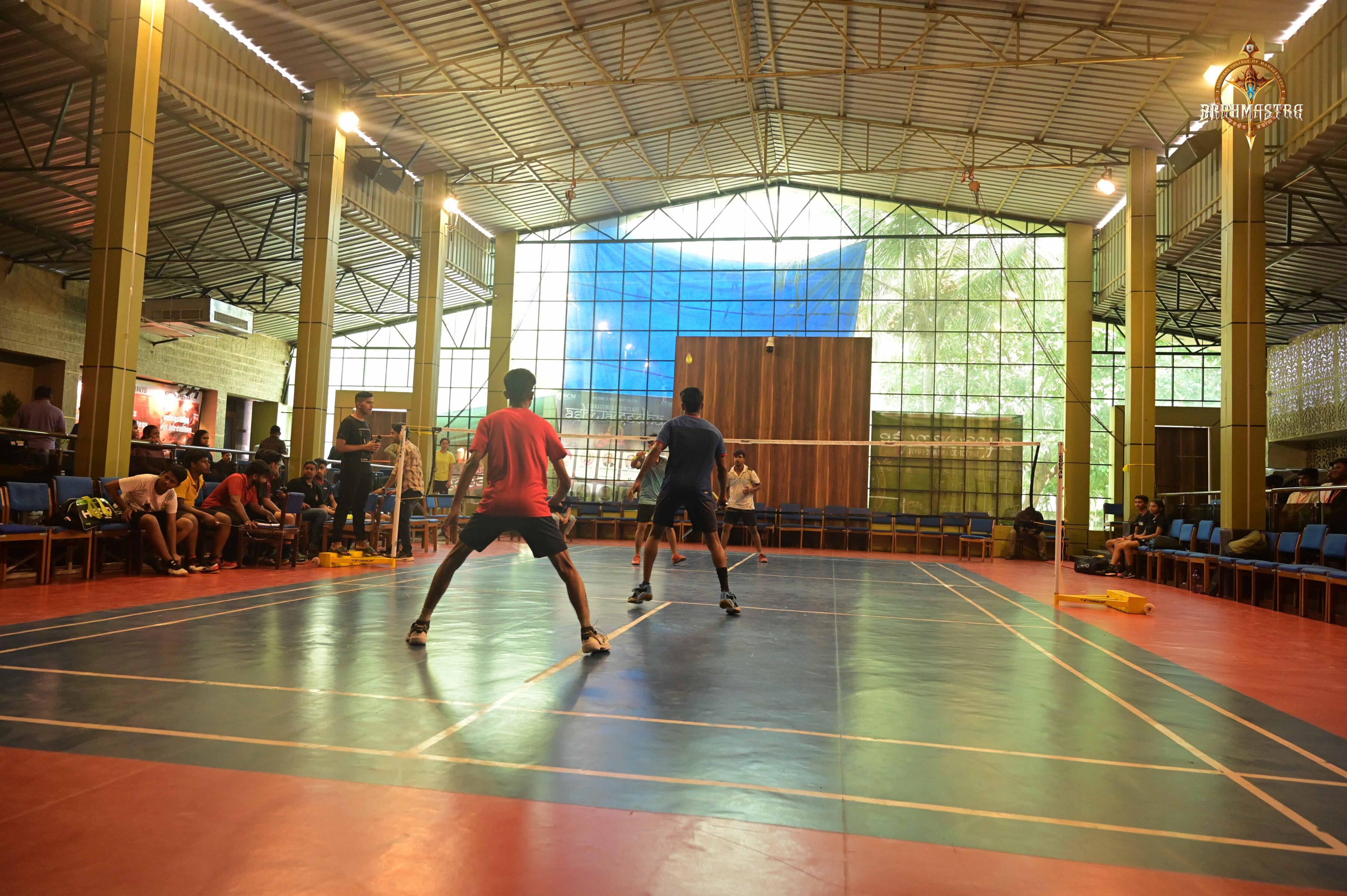 Badminton double - Regional College Of Management
