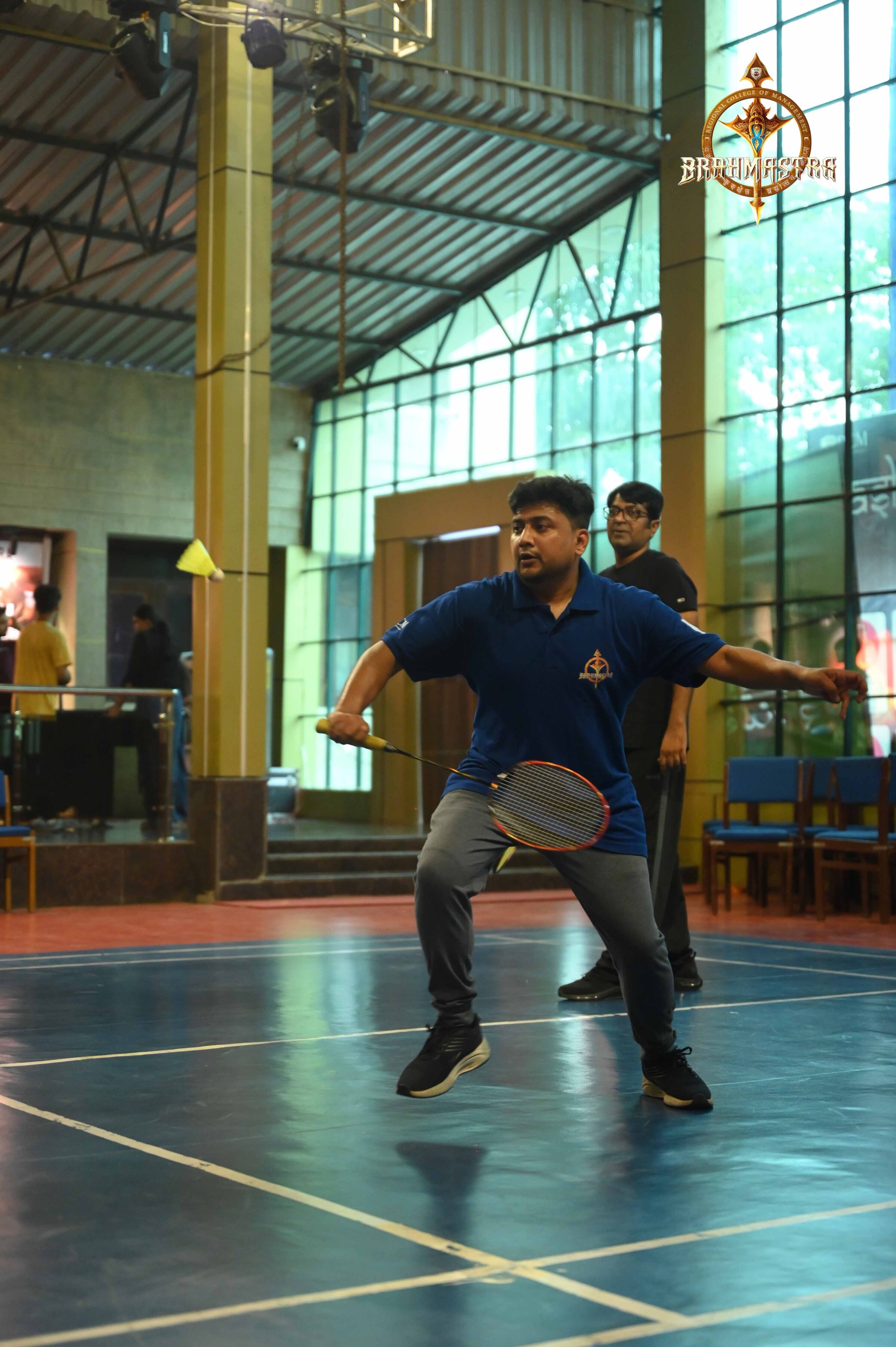 Badminton double - Regional College Of Management